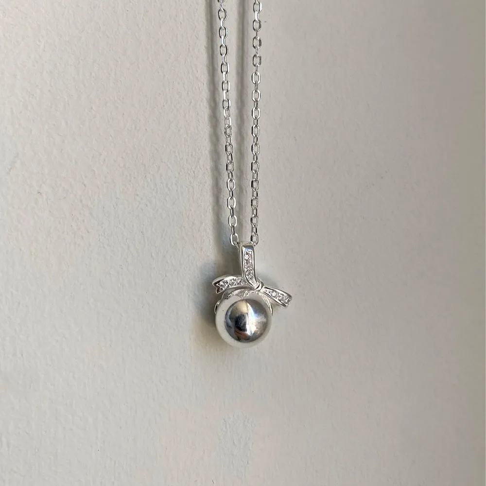 Twinkle ribbon ball necklace - 감도 깊은 취향 셀렉트샵 29CM