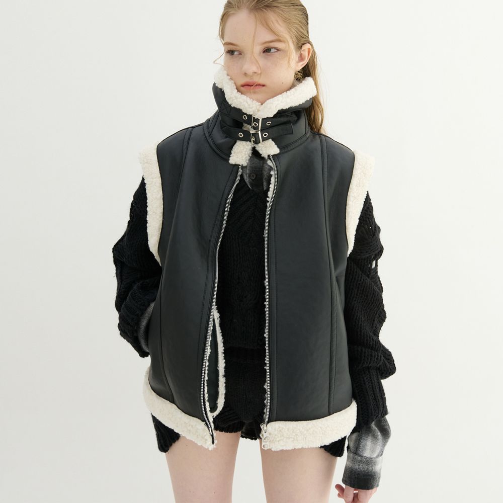 SOFT FAUX SHEARING TRIMMING VEST_BLACK IVORY - 감도 깊은 취향 셀렉트샵 29CM