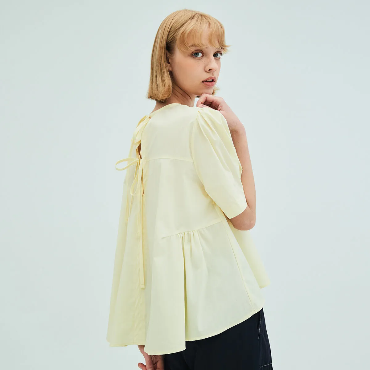 Back Ribbon Detail Peplum Blouse_Yellow - 감도 깊은 취향 셀렉트샵 29CM
